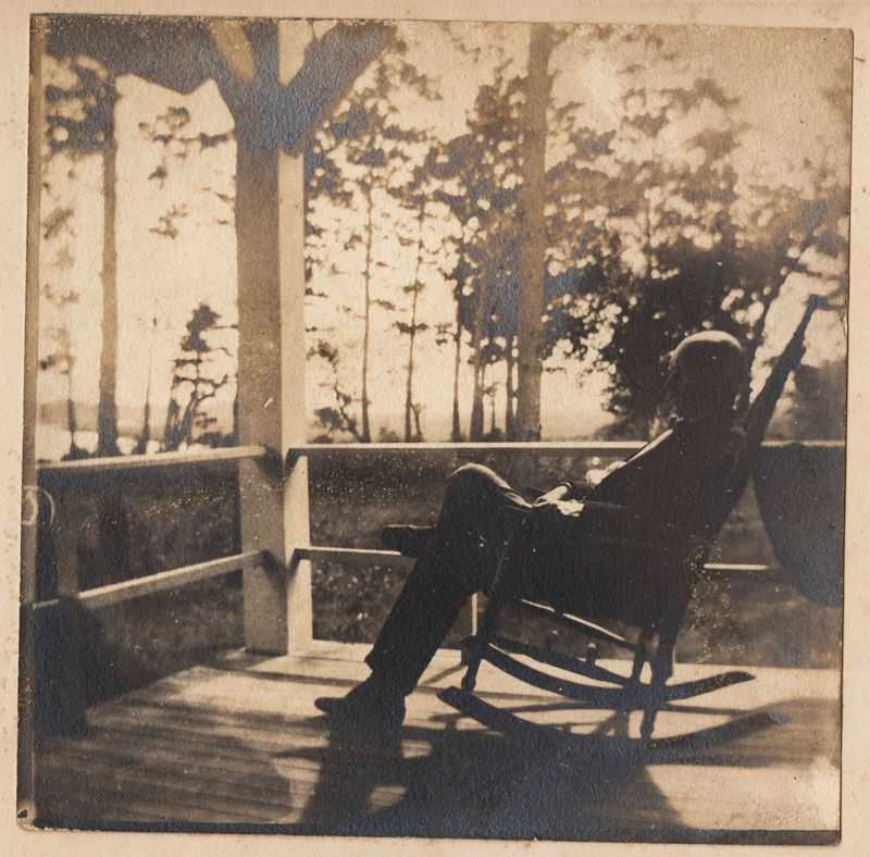 Man sitting in rocking chair on porch - Lowcountry Digital Library ...